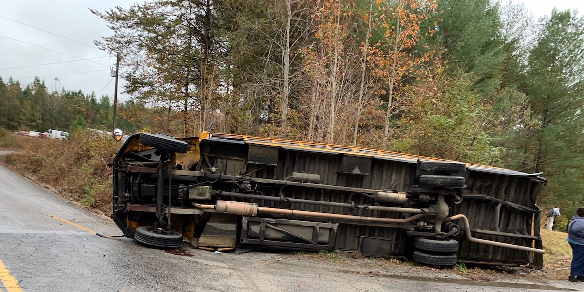 School bus overturns after colliding with dump truck; 6 children injured School bus overturns after colliding with dump truck; 6 children injured