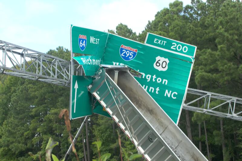 Tractor-trailer driver charged after crash shuts down part of I-64 Tractor-trailer driver charged after crash shuts down part of I-64